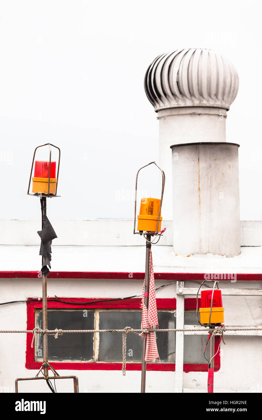 Three red and orange nostalgic rotation beacon lamps with different ...