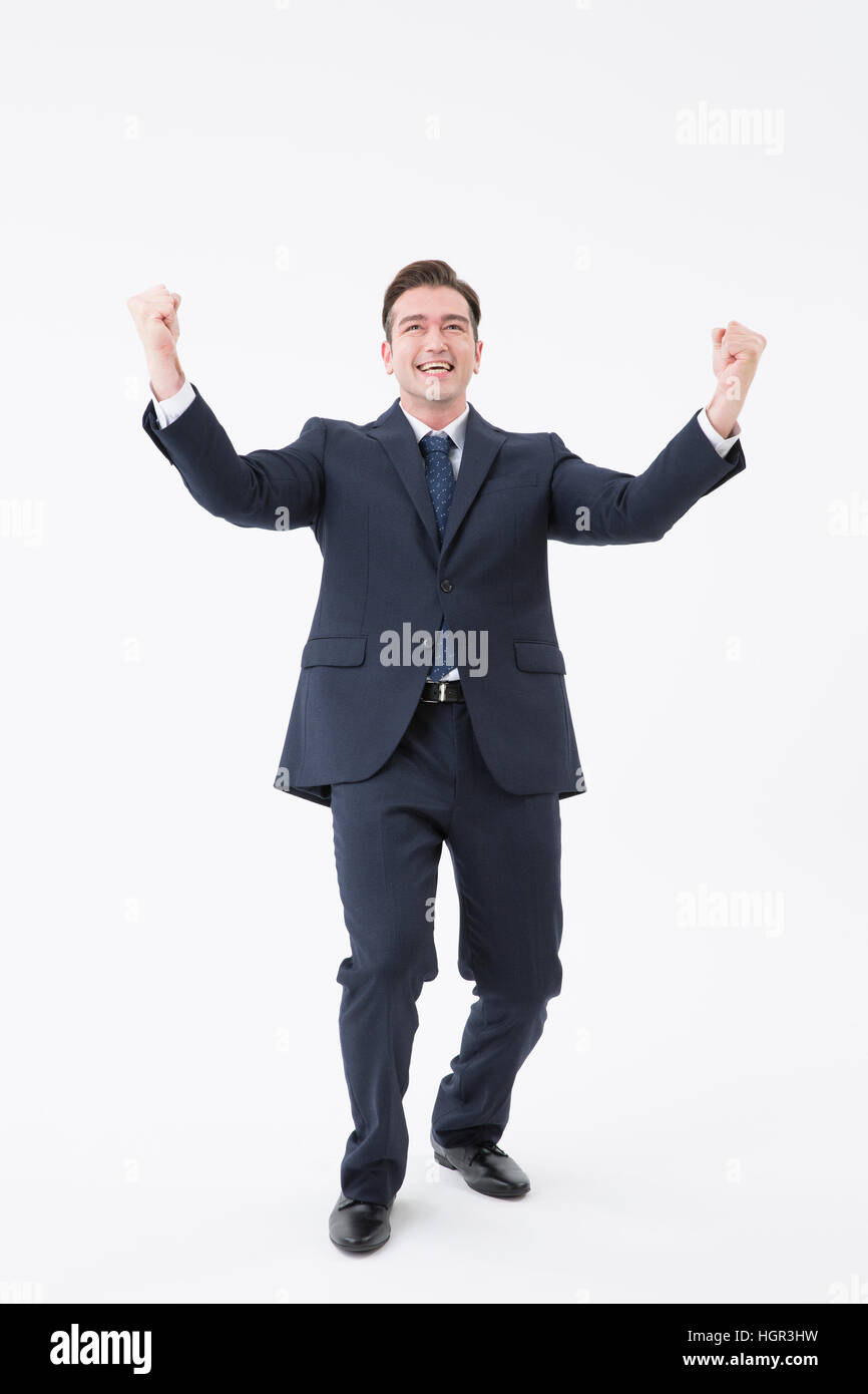 Cheerful global businessman Stock Photo - Alamy