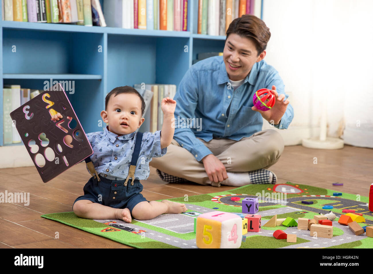 Loving father and baby playing Stock Photo - Alamy
