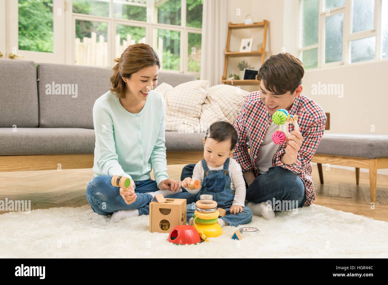 Loving father playing with baby Stock Photo - Alamy