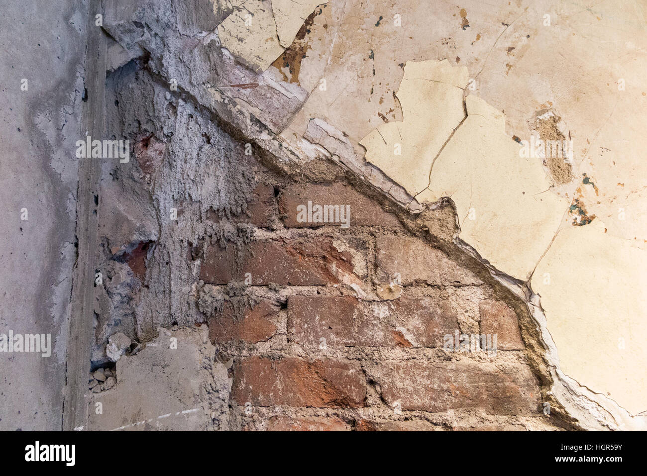 Brick through plaster hi-res stock photography and images - Alamy