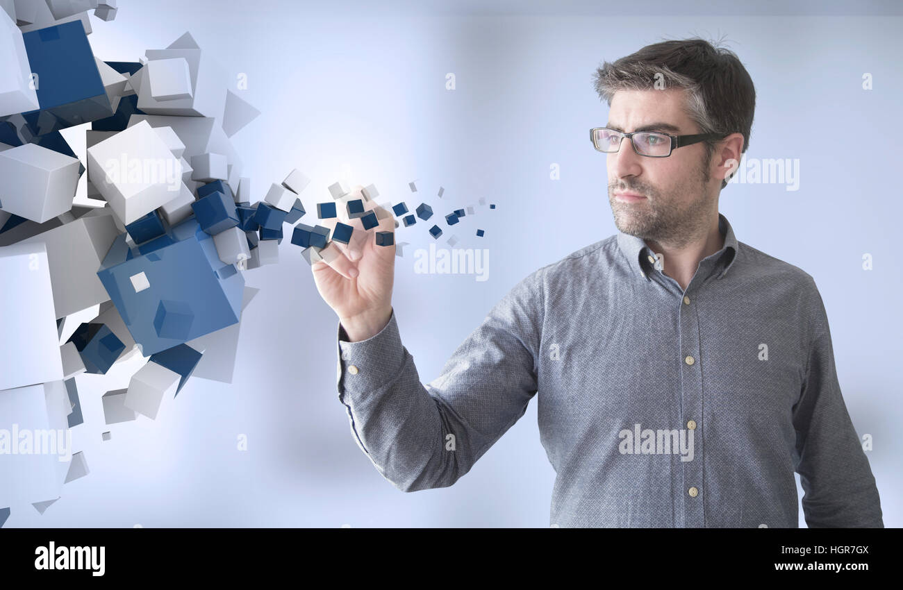 businessman touching blue cubes Stock Photo - Alamy