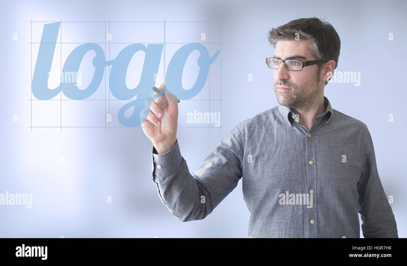 businessman designing a logo Stock Photo - Alamy