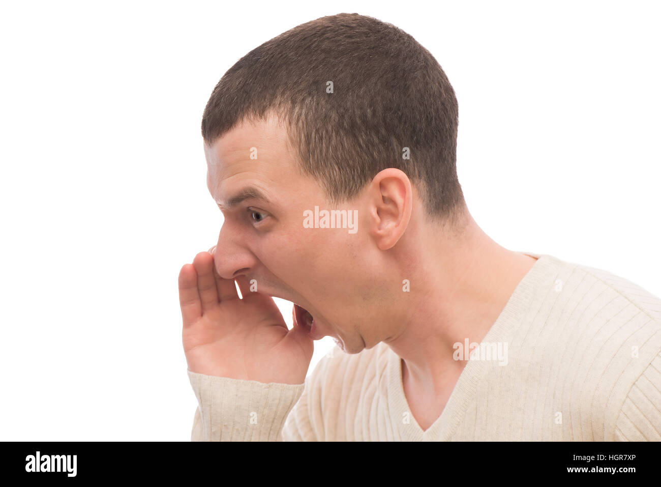 angry man shouting loudly on a white background Stock Photo - Alamy