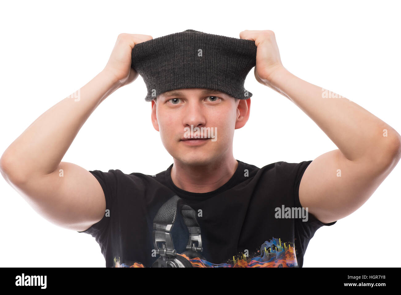 guy in a hat posing on a white background isolated Stock Photo - Alamy