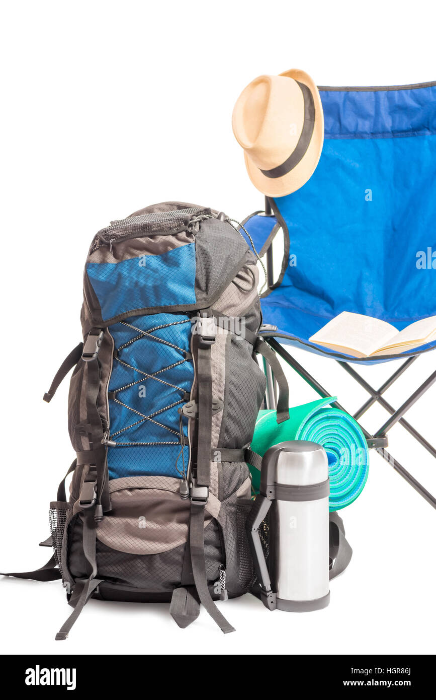 backpack and folding chair ready for the trip to nature Stock Photo - Alamy