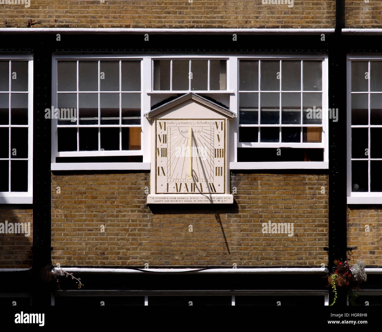 Sundial a the Guildhall School of Music & Drama, London Stock Photo - Alamy
