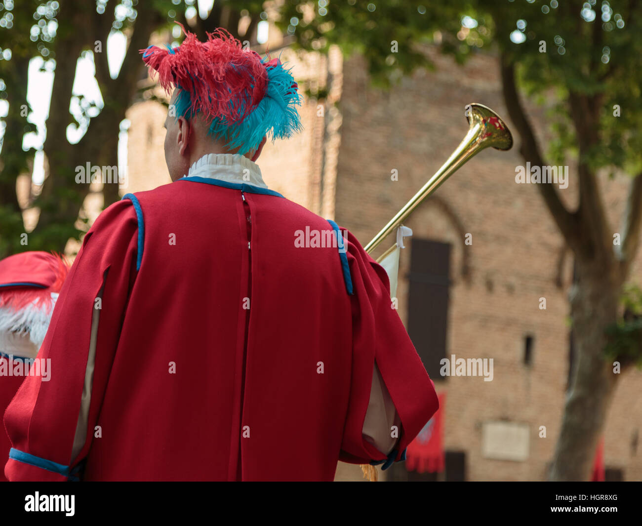 Performer Dressed in Red with Long Trumpet during Procession during ...