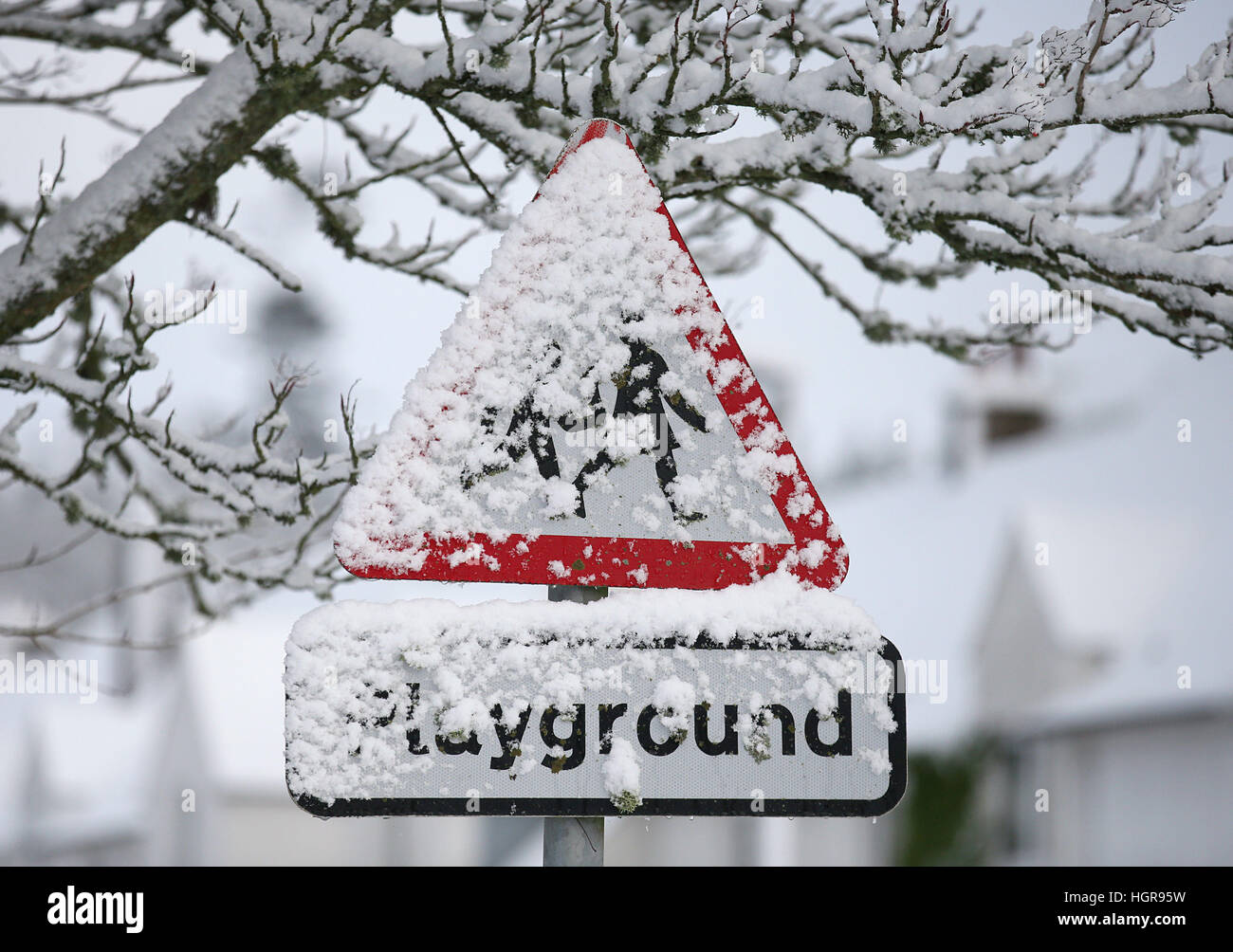 A snow covered sign in Braco, near Stirling, as blizzard conditions are ...
