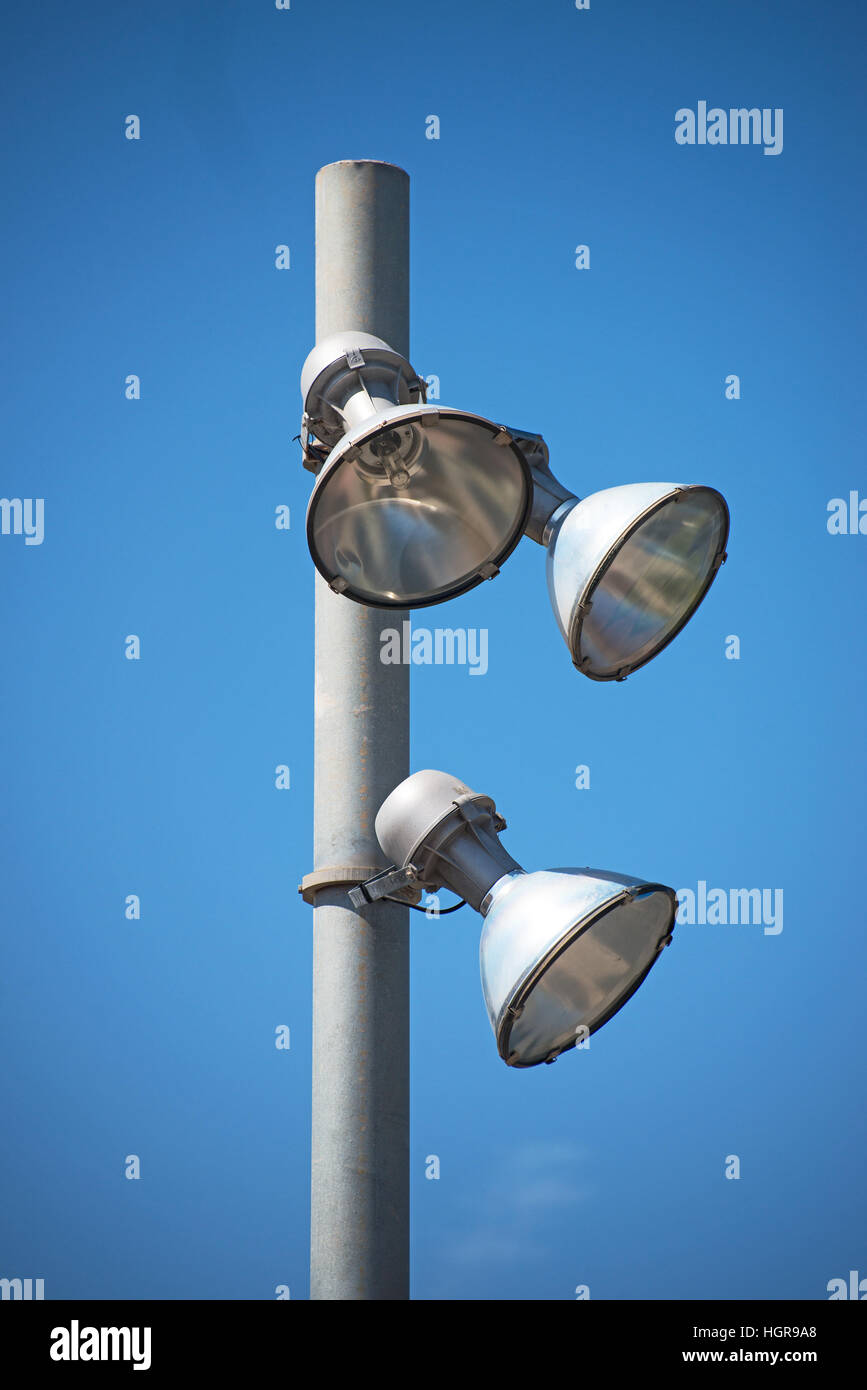 Three round street lights over blue sky Stock Photo - Alamy