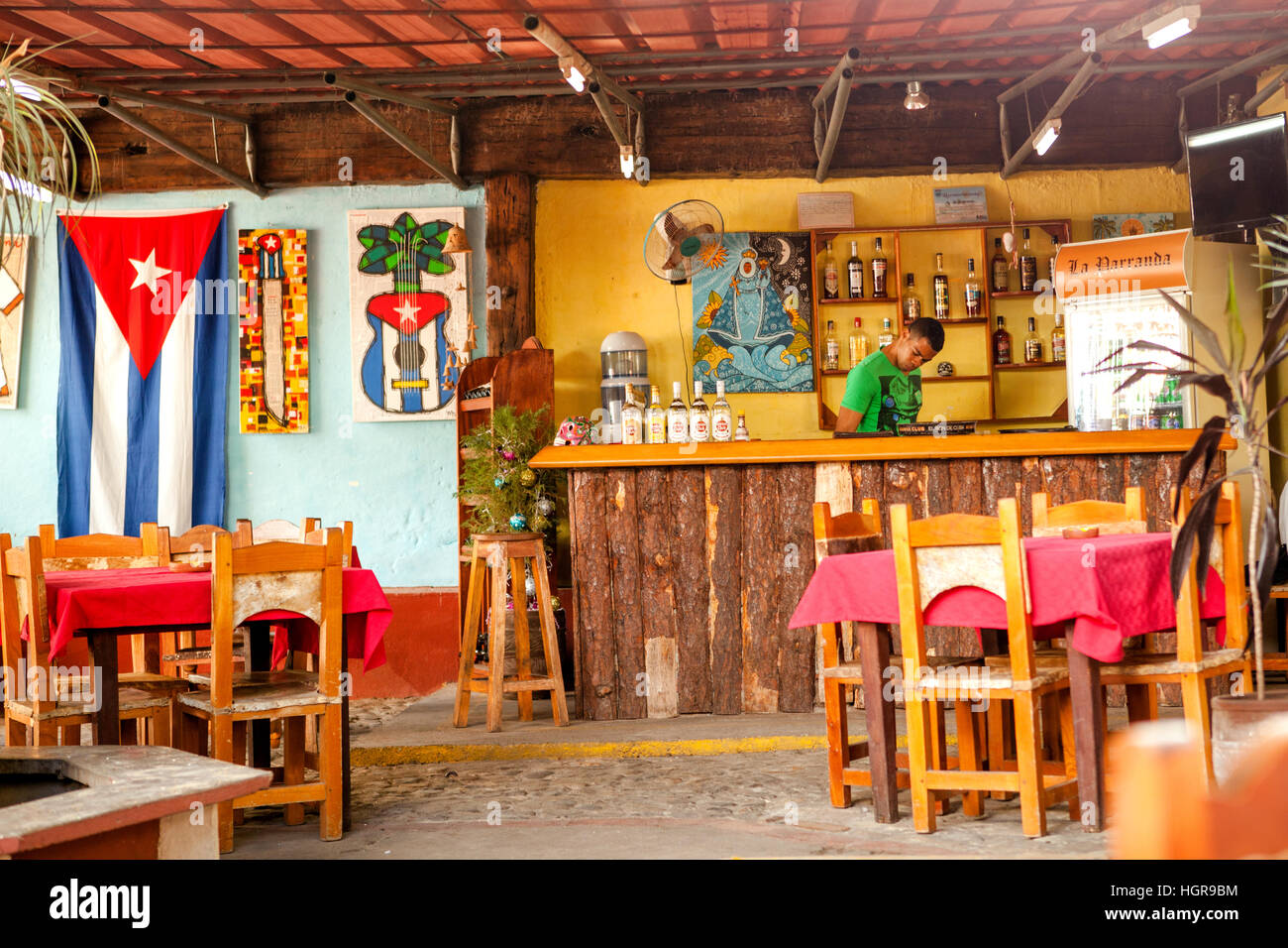 Trinidad, Cuba - December 18, 2016: Barkeeper in a bar/ restaurant in ...