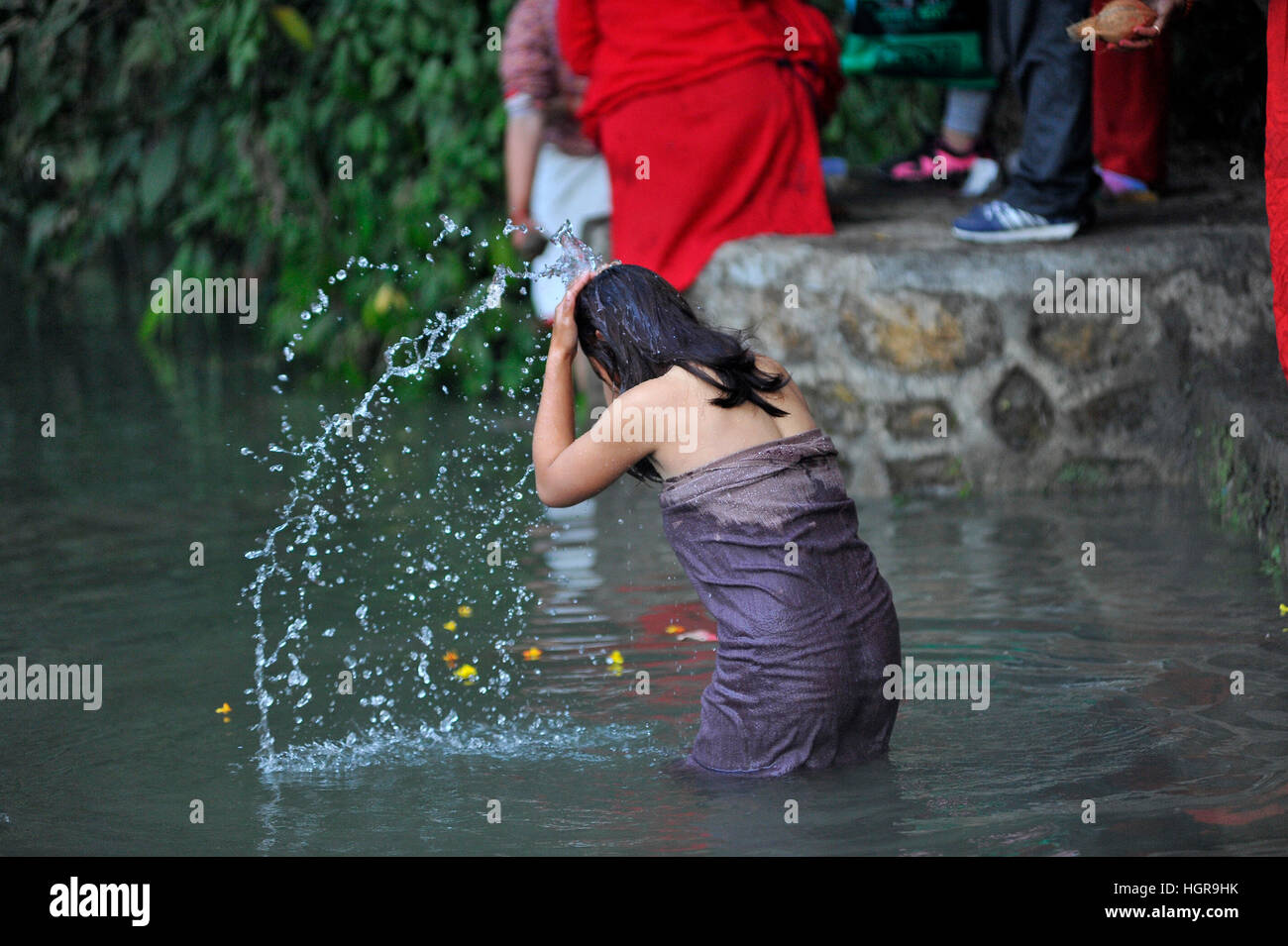 Nepalese women holy bath hi-res stock photography and images - Alamy