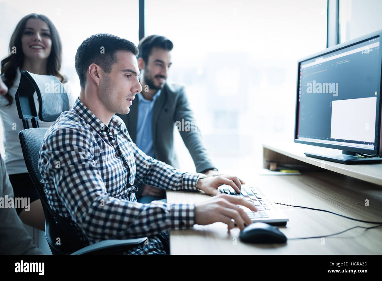 Business collaboration in office by IT colleagues and programmers Stock ...