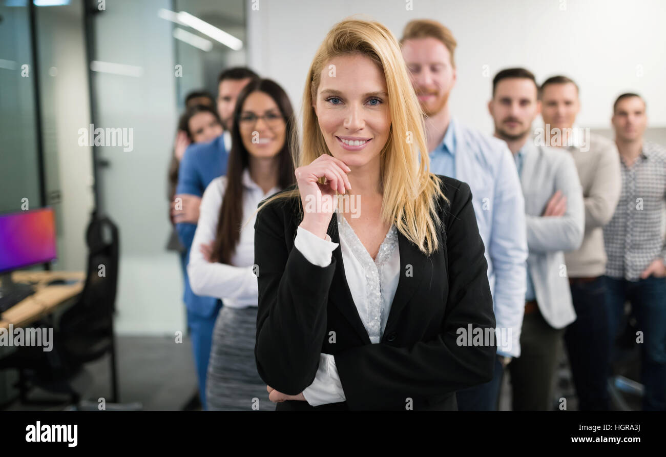 Portrait of business woman in office representing company Stock Photo ...