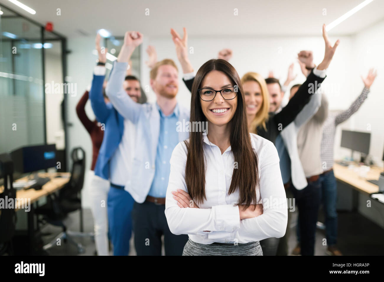 Portrait of group of successful businesspeople happy at work Stock ...