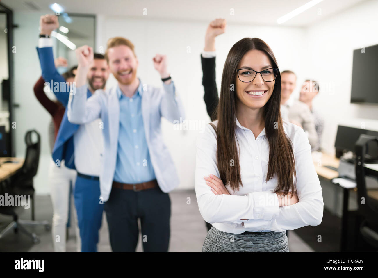 Portrait of group of successful businesspeople happy at work Stock ...