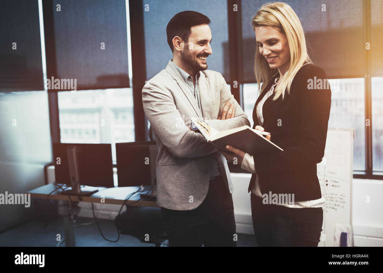 Female secretary explaining boss in hi-res stock photography and images ...