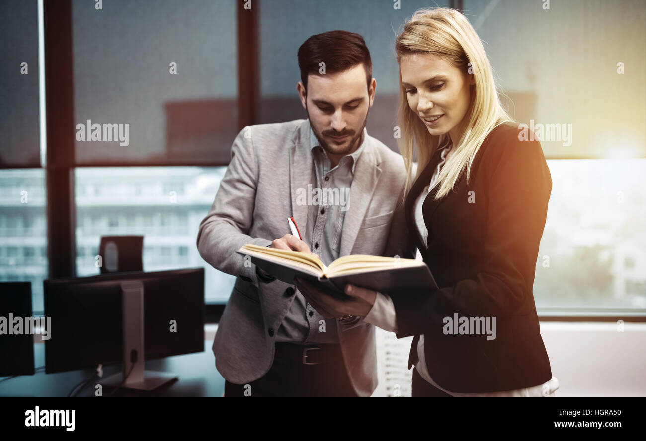 Female secretary explaining boss in hi-res stock photography and images ...