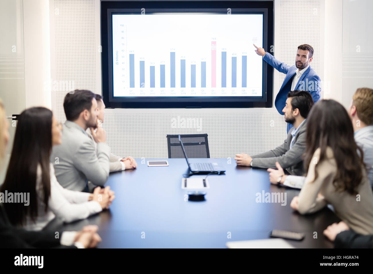 Business people analyzing data at meeting in office and doing ...