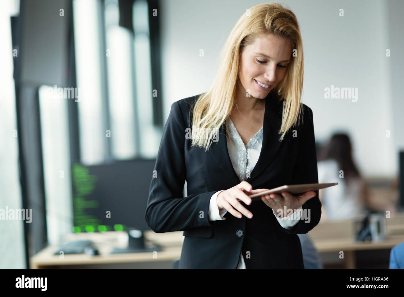 Businesswoman working in information technology company office Stock ...