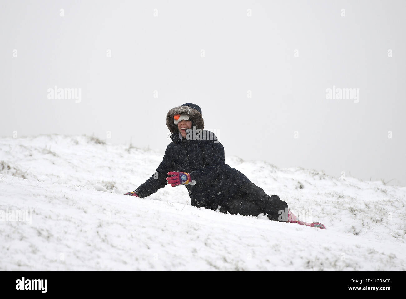 Elanor Rowbotham from Queensland, Australia slips on snow on Mam Tor ...