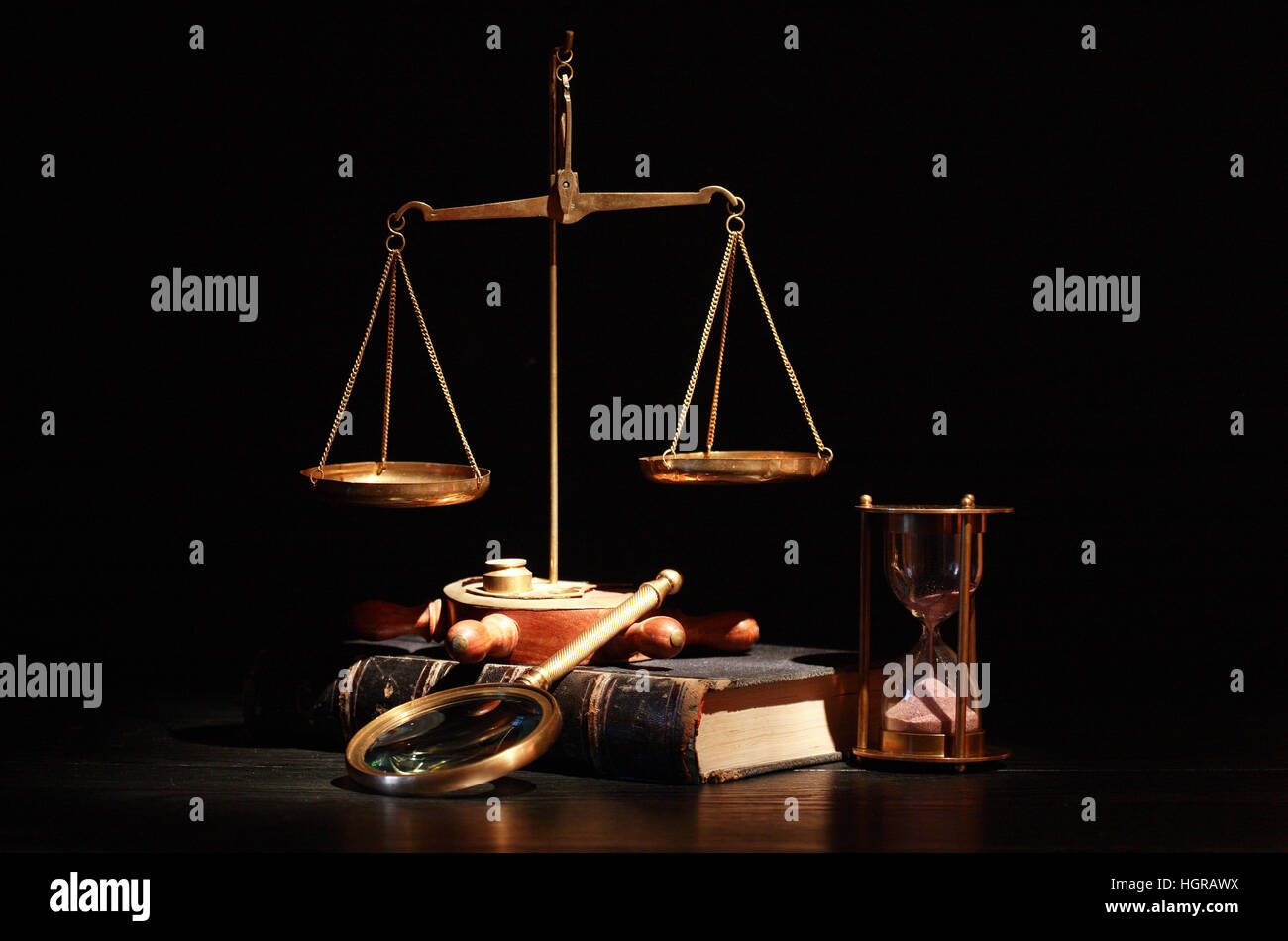 Vintage still life. Weight scale and tools on background with old books ...