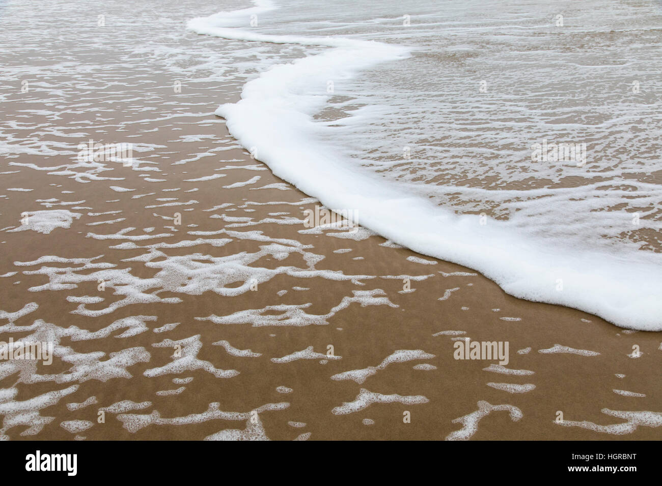 Sea foam, it is formed by strong wind and organic particles on the ...