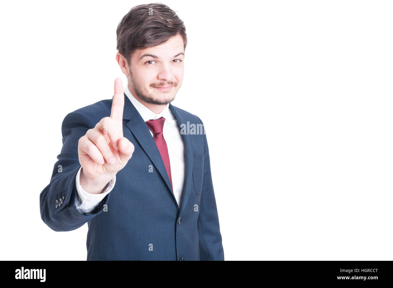 Smiling man wearing suit showing number one with one hand isolated on ...