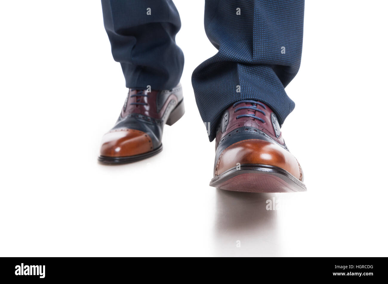 Close-up of man shoes and trousers in walking position isolated on ...