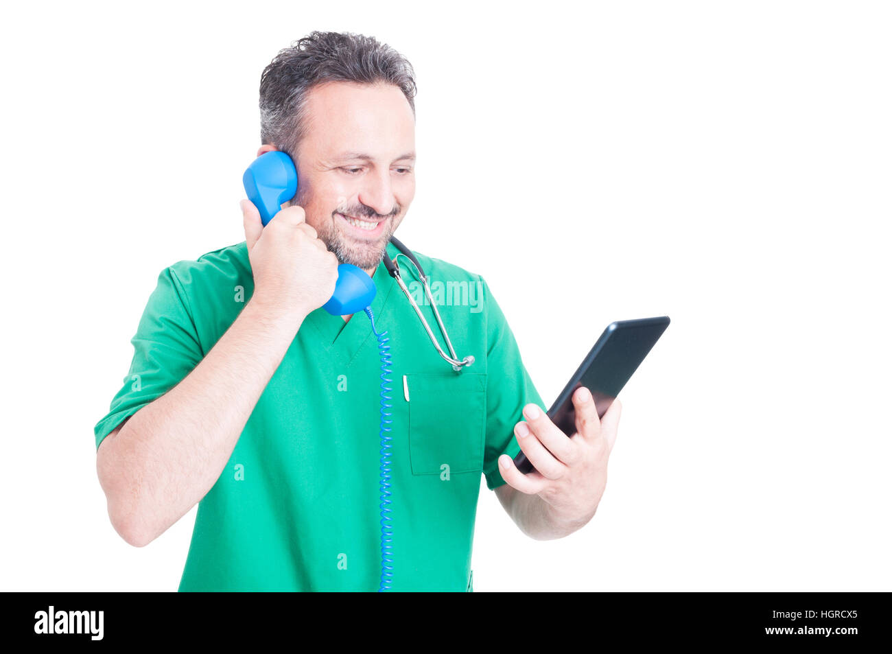 Multitasking concept with medical doctor talking on vintage receiver ...