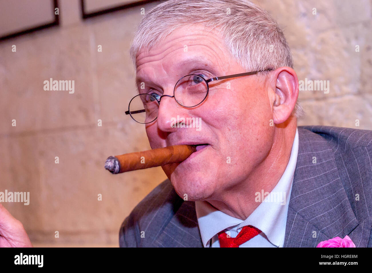 Artist David Hockney smoking a cigar, in a Brighton restaurant, during ...