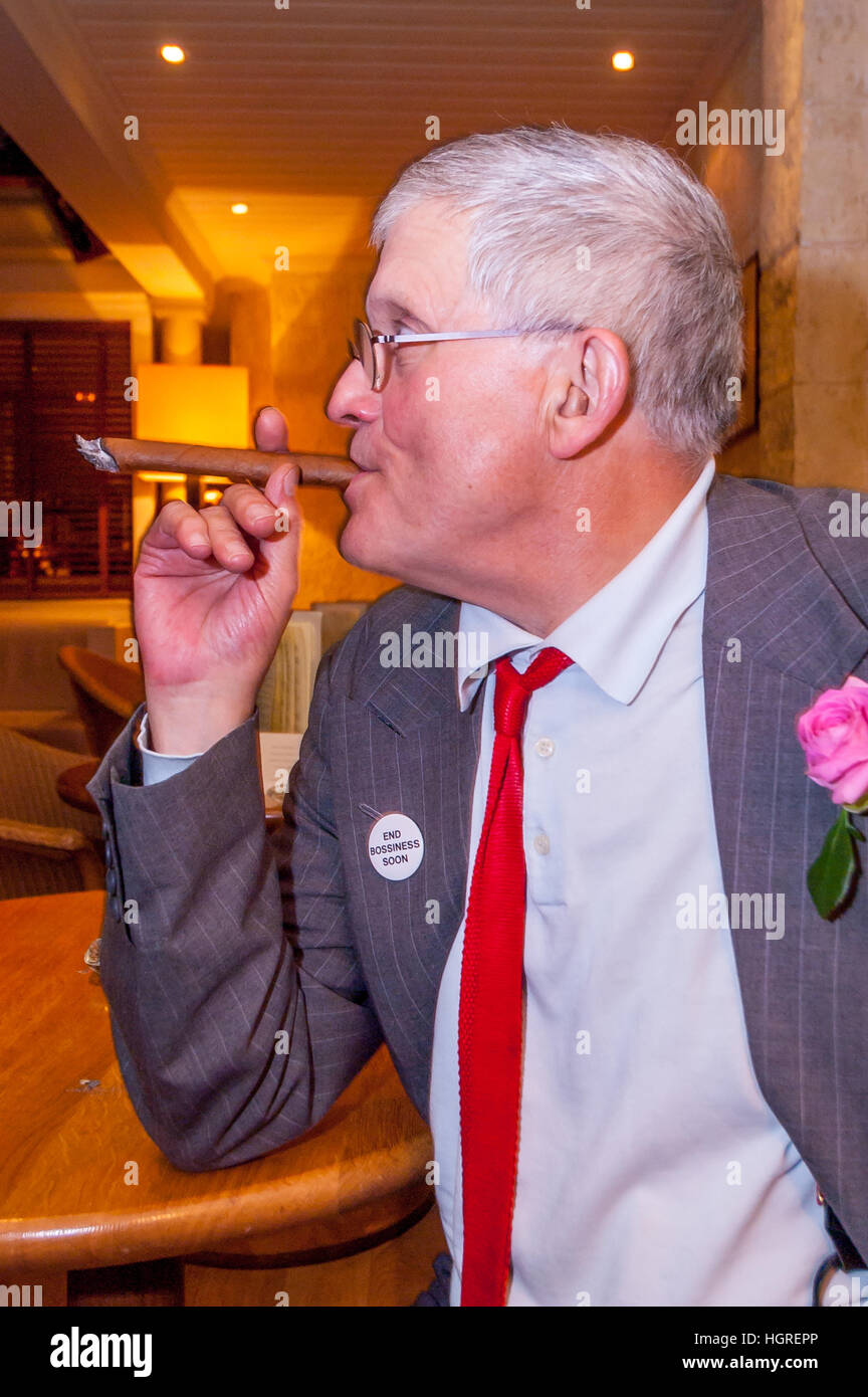 Artist David Hockney smoking a cigar, in a Brighton restaurant, during ...