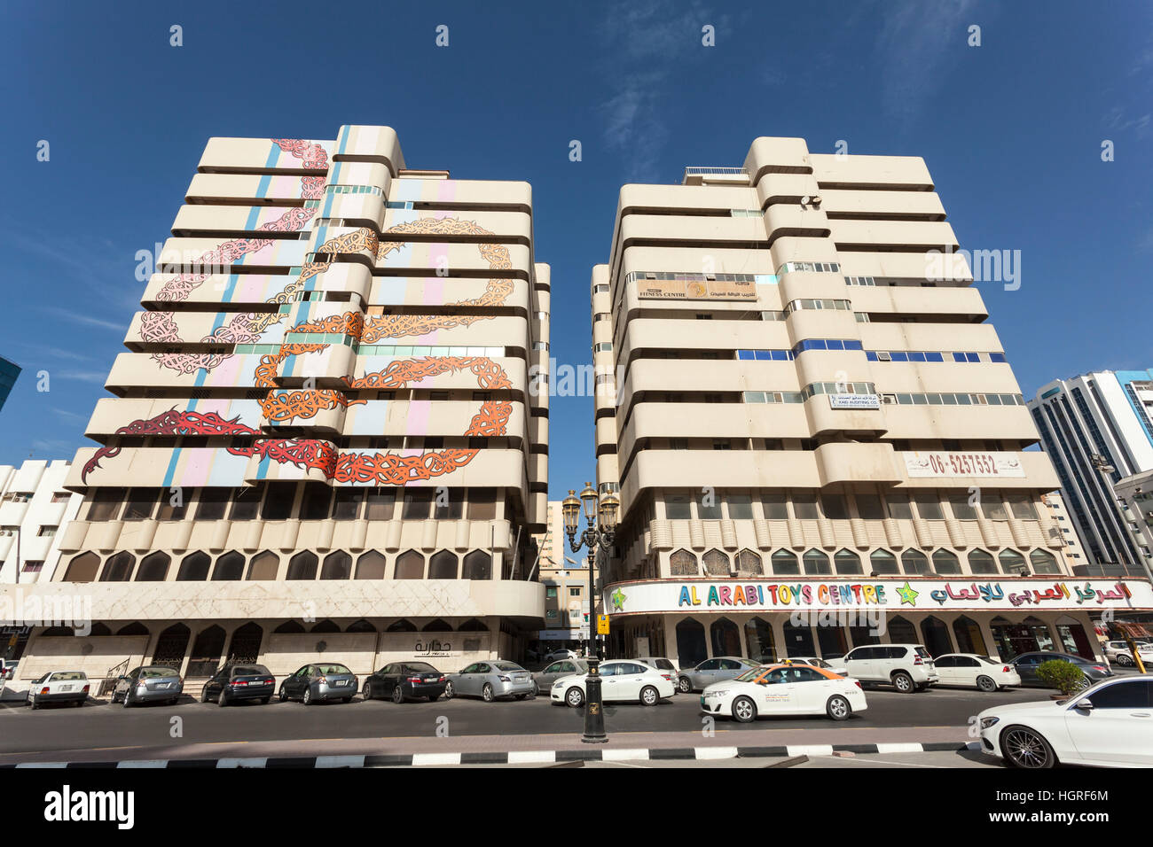 Colorful decorated buildings in the city of Sharjah, United Arab ...