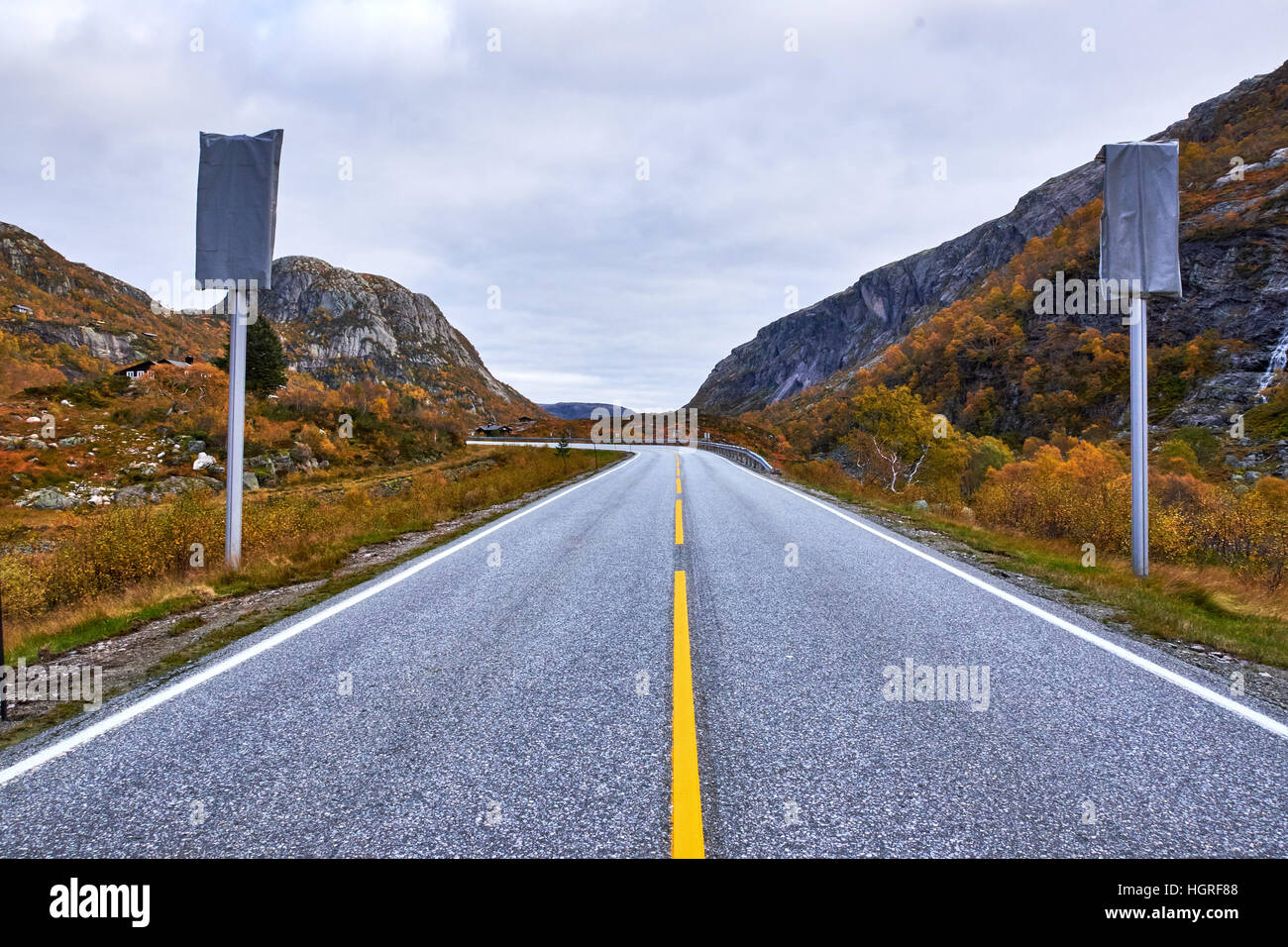Route 45 in Rogaland, Norway, taking a sharp turn to the left, between ...
