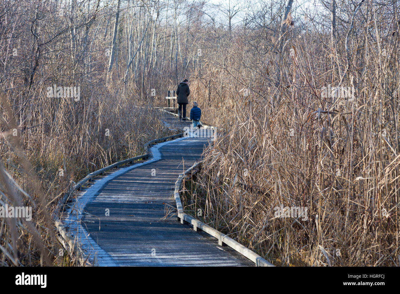 Mother & child / kid / kids daughters on walkway pathway foot path ...