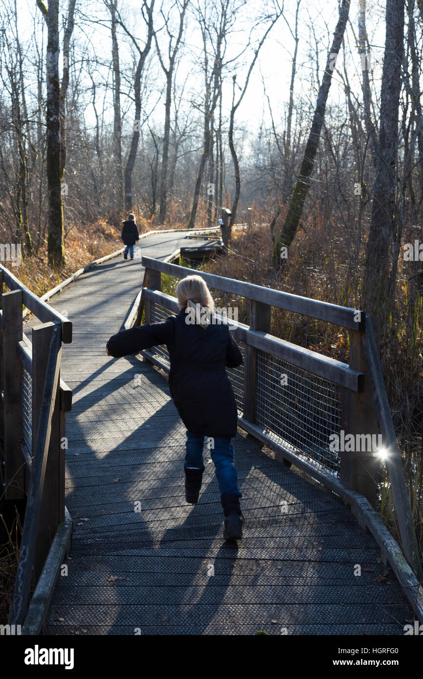 Child girl tourist tourists & hikers walkway / pathway / foot path ...