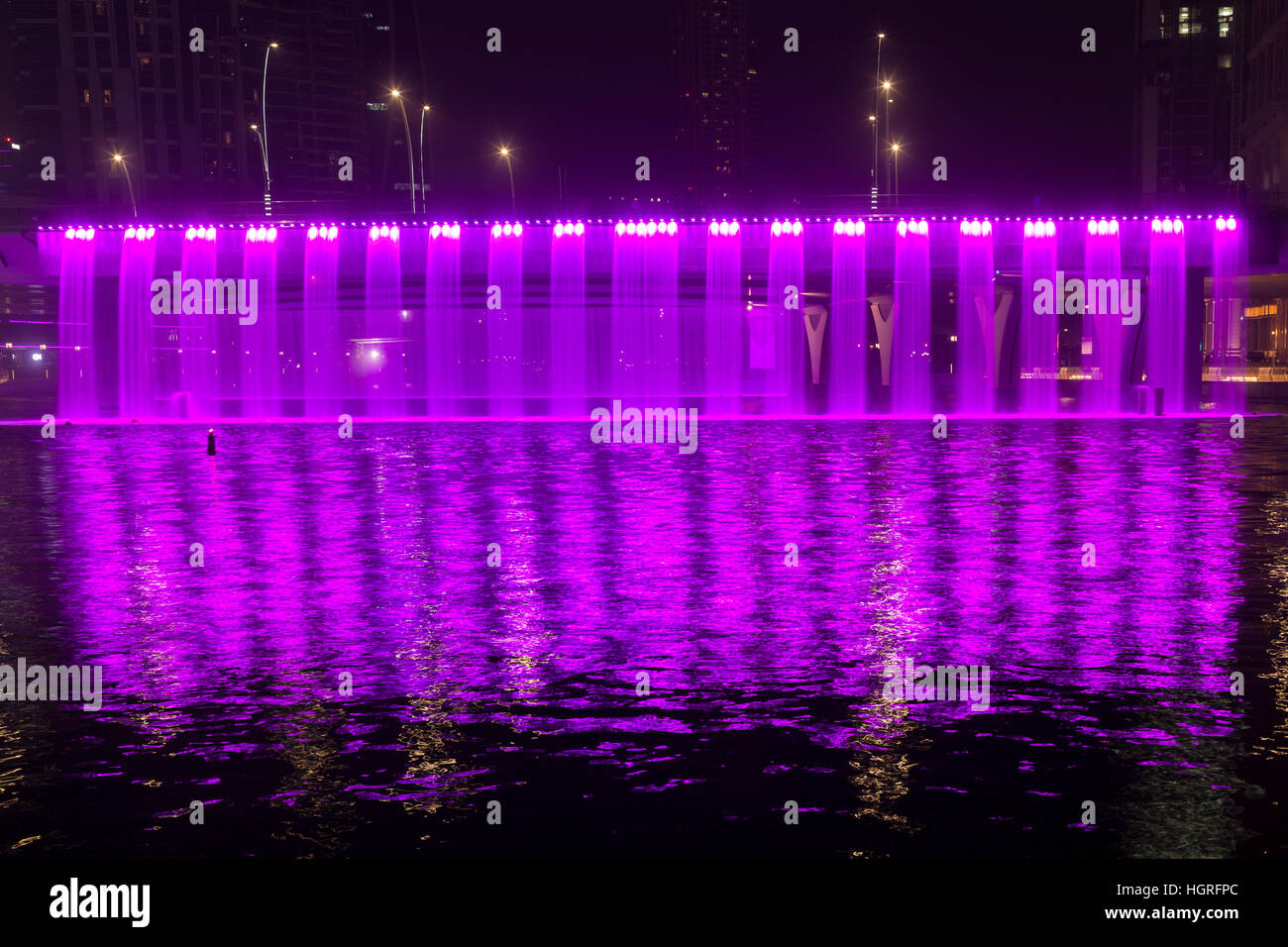 Purple Waterfall at the Dubai Water Canal Stock Photo - Alamy