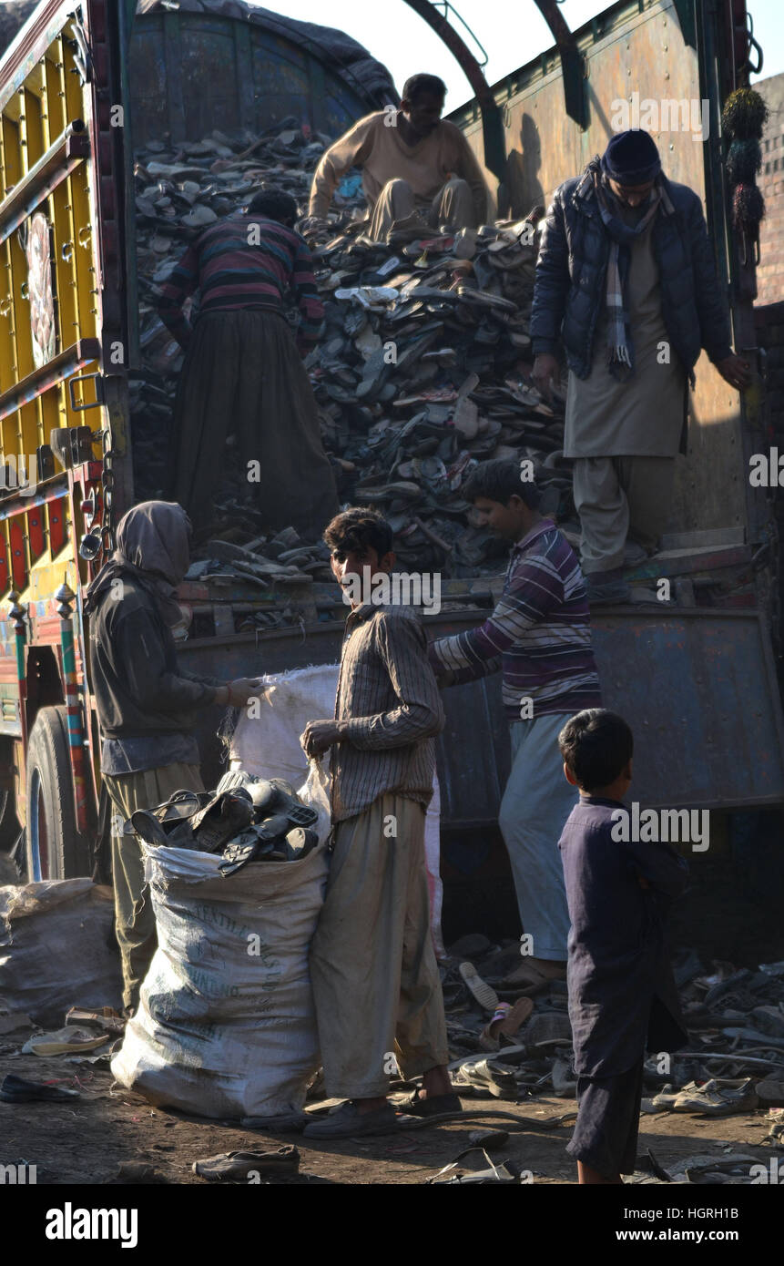 Lahore, Pakistan. 12th Jan, 2017. Pakistani people busy in their ...