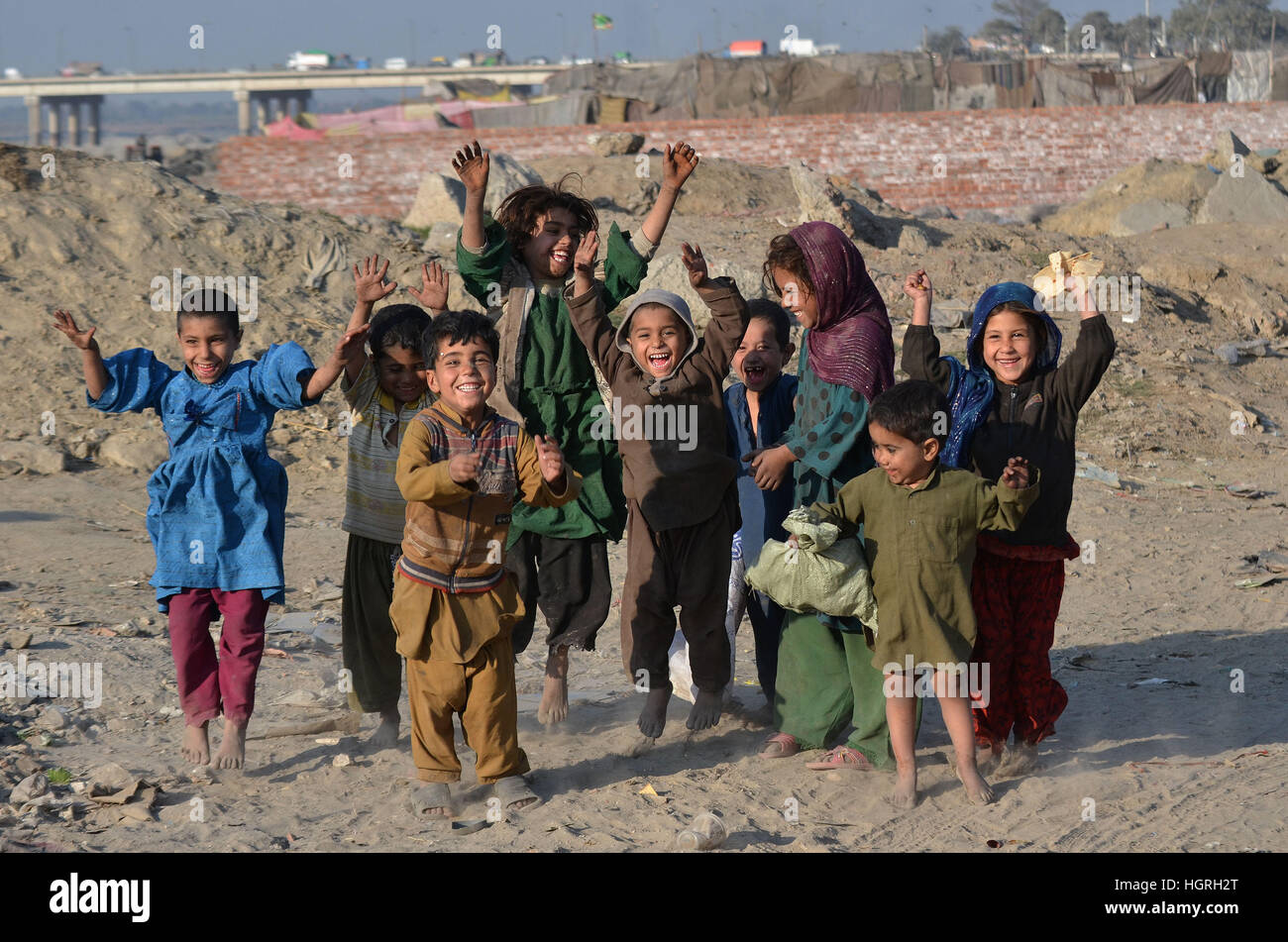 Lahore, Pakistan. 12th Jan, 2017. Pakistani people busy in their ...