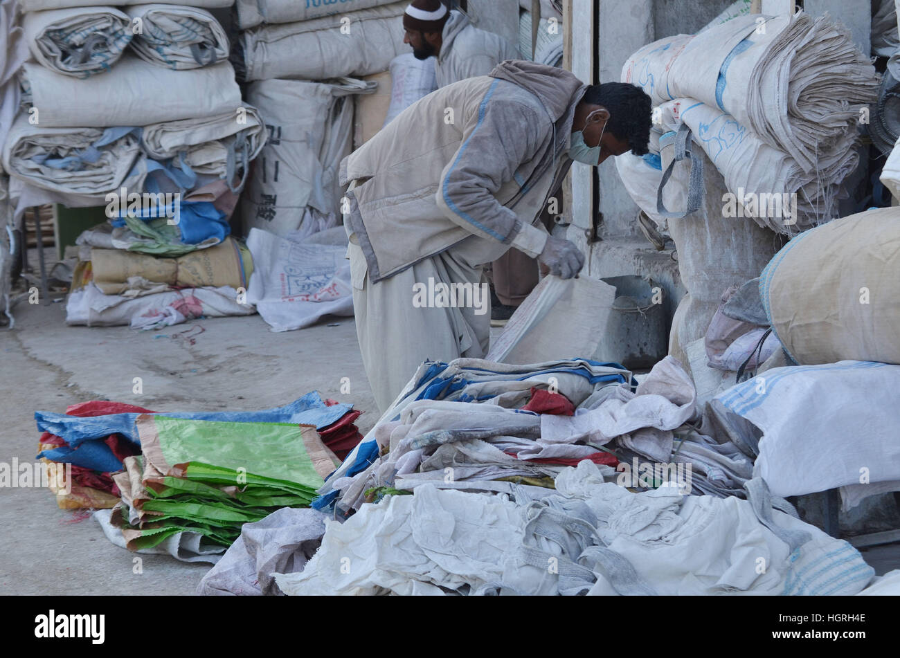 Lahore, Pakistan. 12th Jan, 2017. Pakistani people busy in their ...