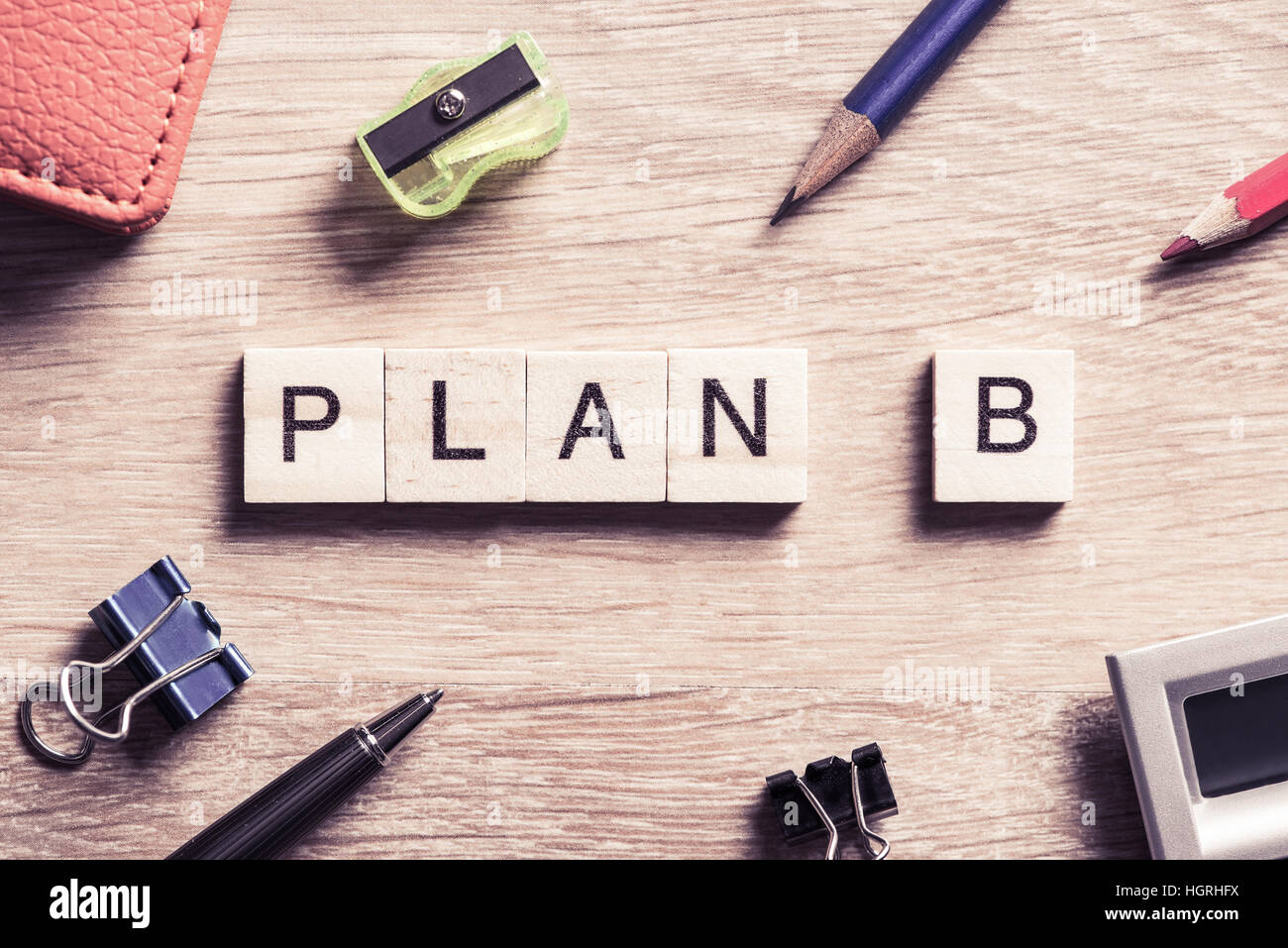 Conceptual business keywords on table with elements of game making ...