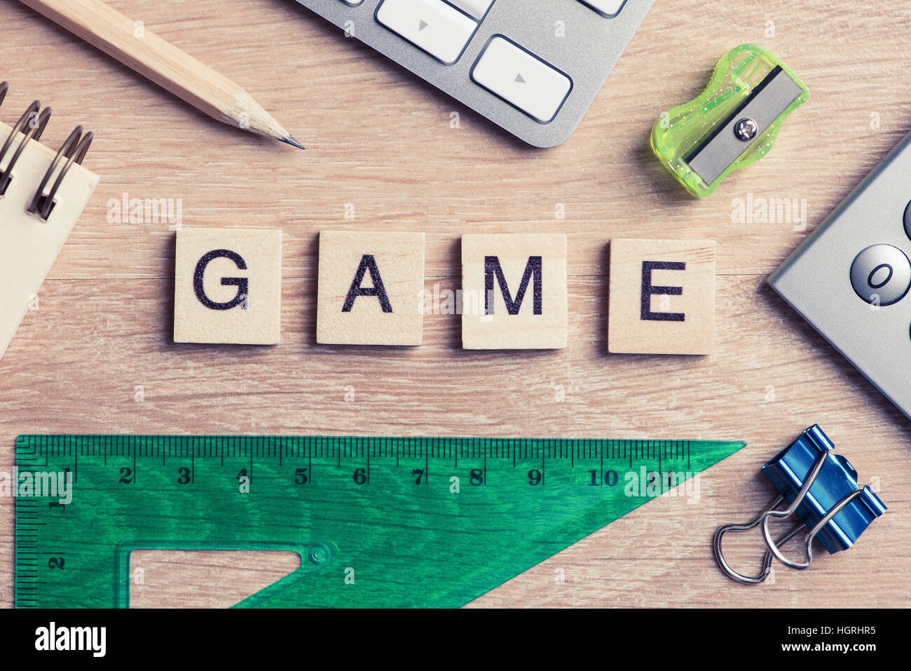 Elements of education game spelling words on wooden office table Stock ...