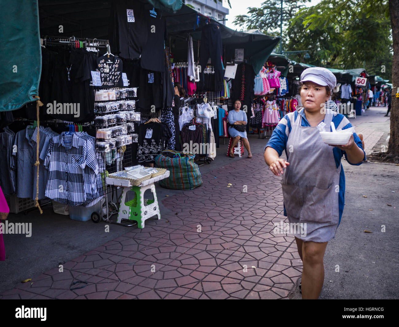 Bangkok, Bangkok, Thailand. 12th Jan, 2017. A food vendor delivers ...