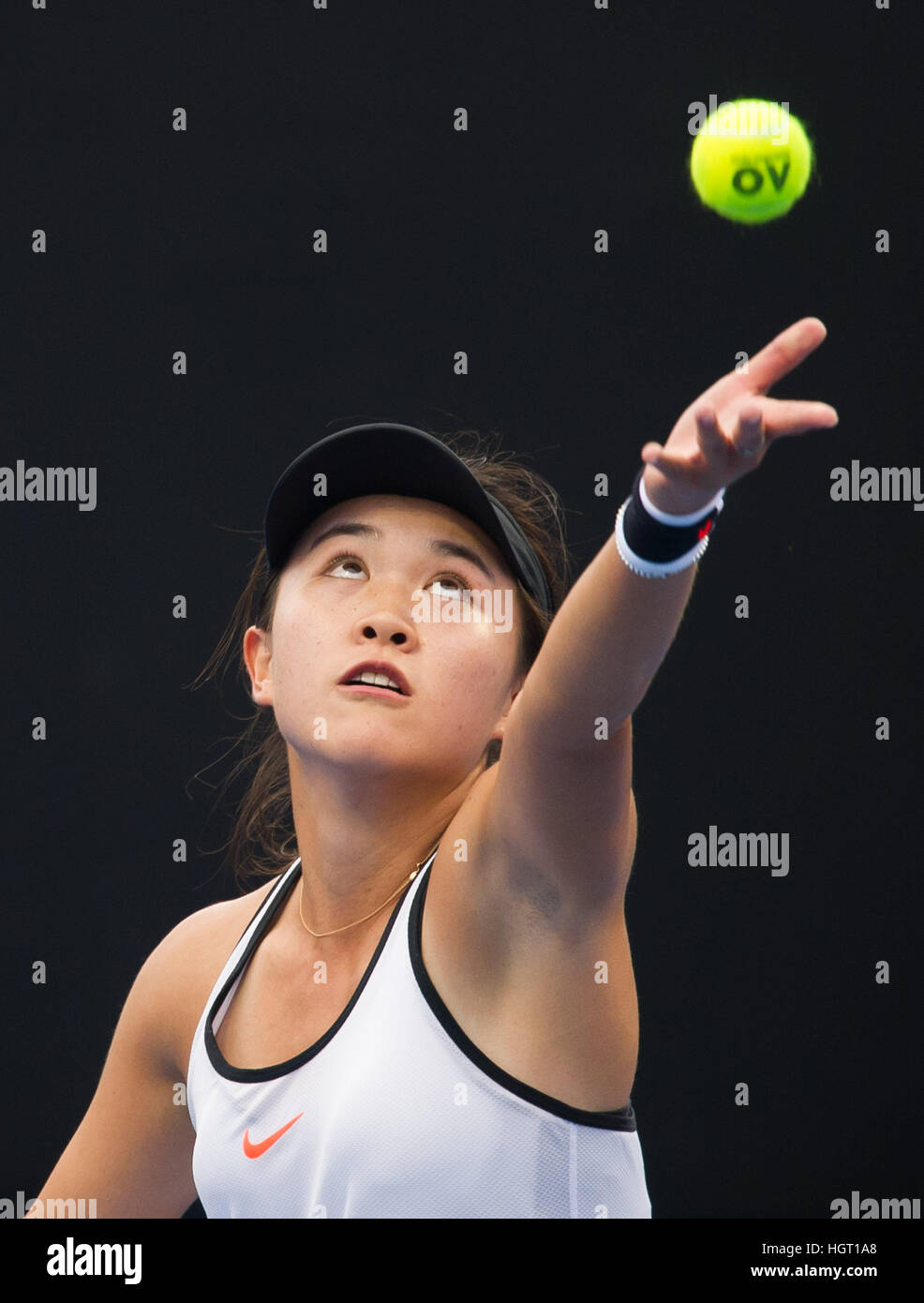Melbourne, Australia. 13th Jan, 2017. Zhu Lin of China serves the ball ...