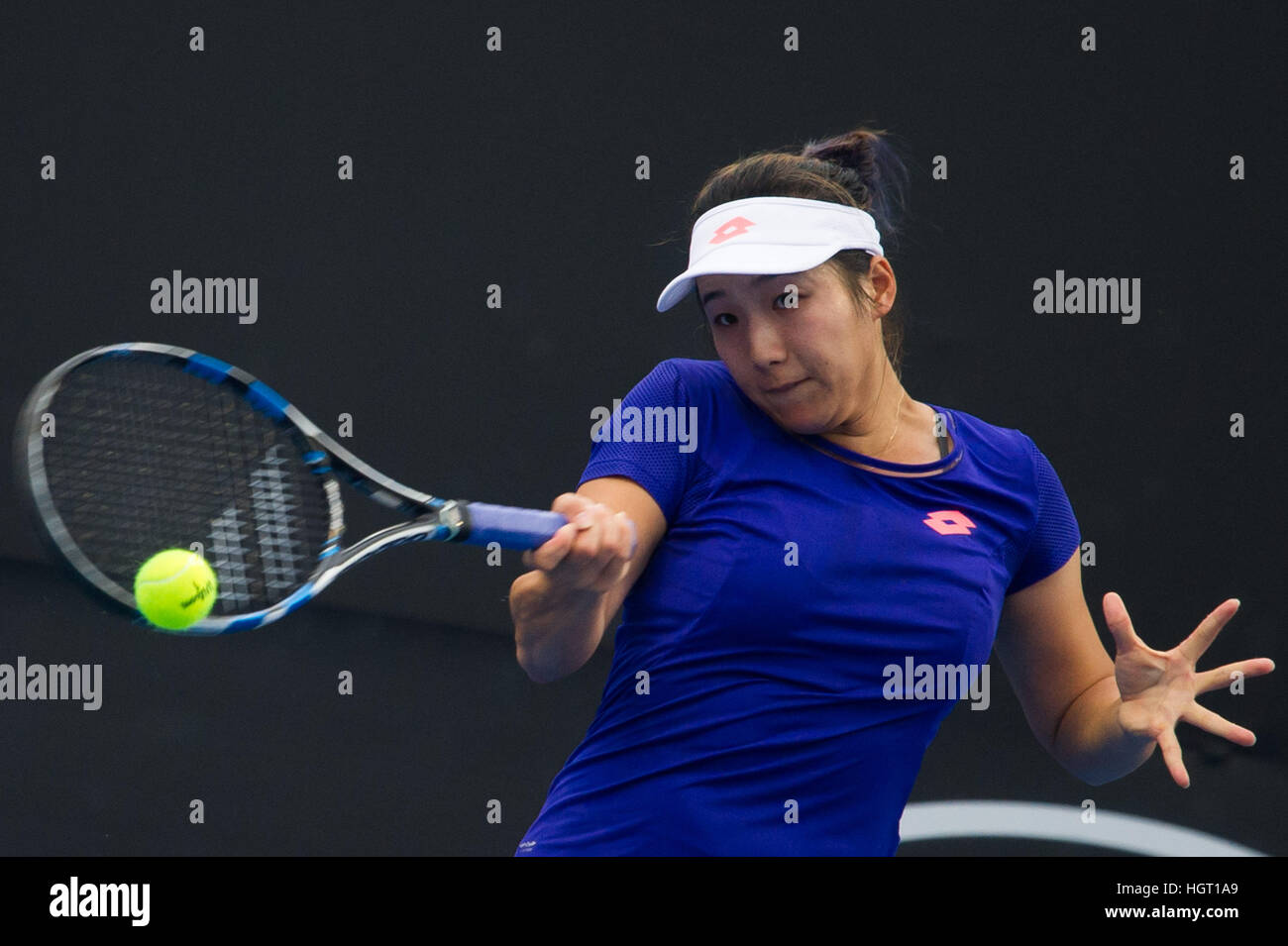 Melbourne, Australia. 13th Jan, 2017. Zhang Kailin of China hits the ...