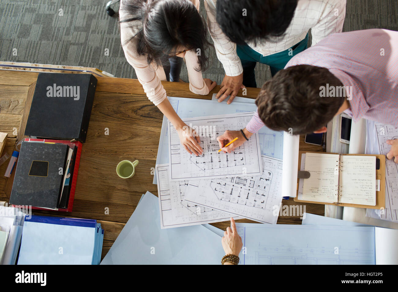 Architects working in the office Stock Photo - Alamy