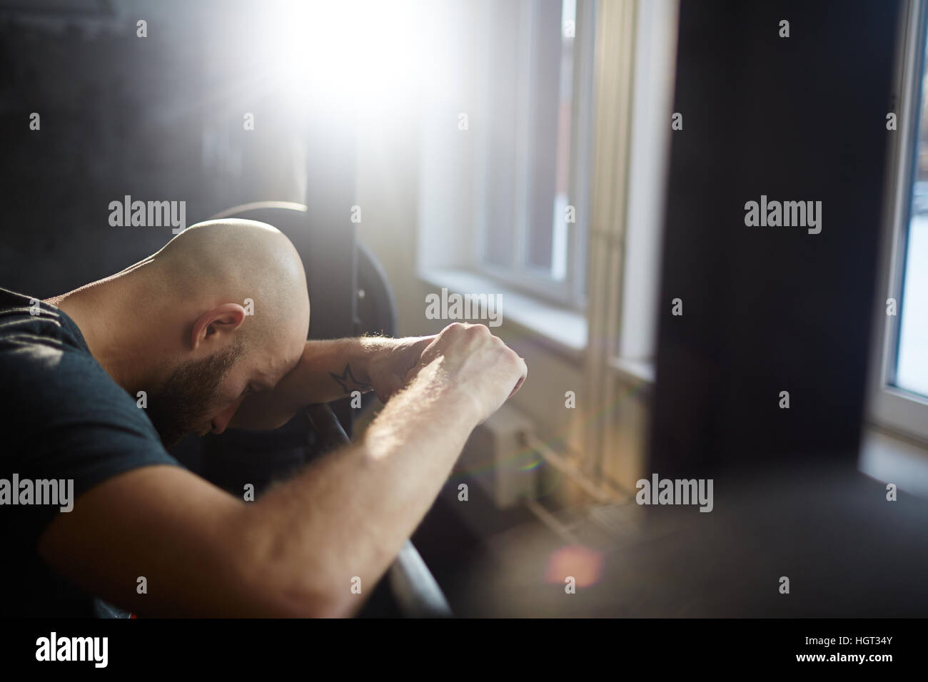 Tired sportsman having rest hi-res stock photography and images - Alamy