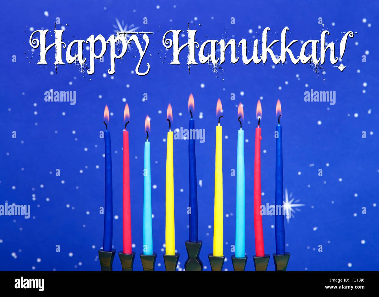 a nine-branched menorah (also called a Chanukiah or Hanukiah) burning ...