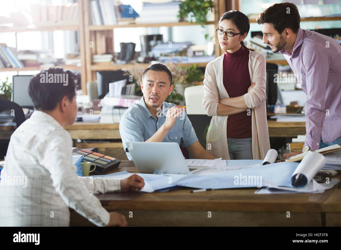 Architects talking in the office Stock Photo - Alamy