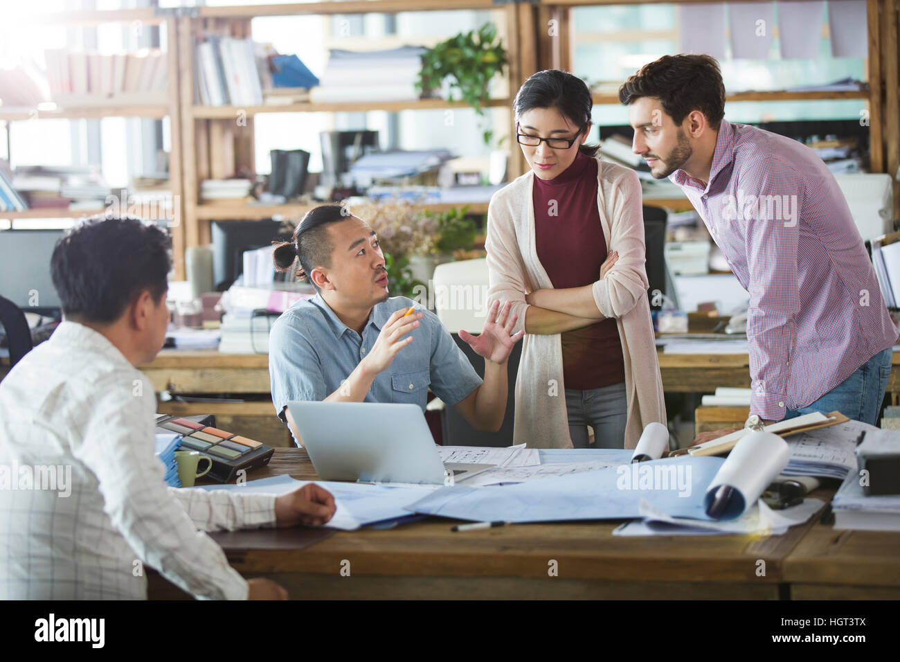 Architects talking in the office Stock Photo - Alamy